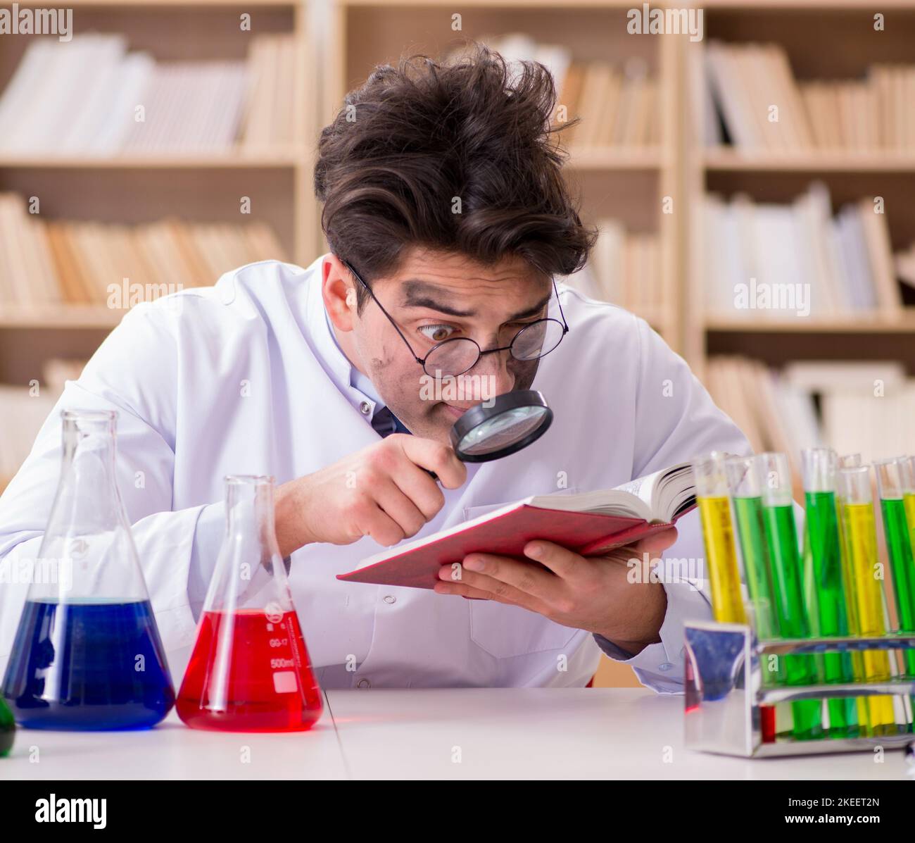 The mad crazy scientist doctor doing experiments in a laboratory Stock ...