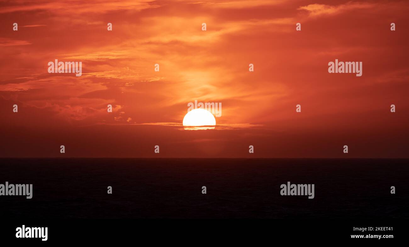 Dramatic Colorful Sunset Sky over North Atlantic Ocean. Abstract Red ...