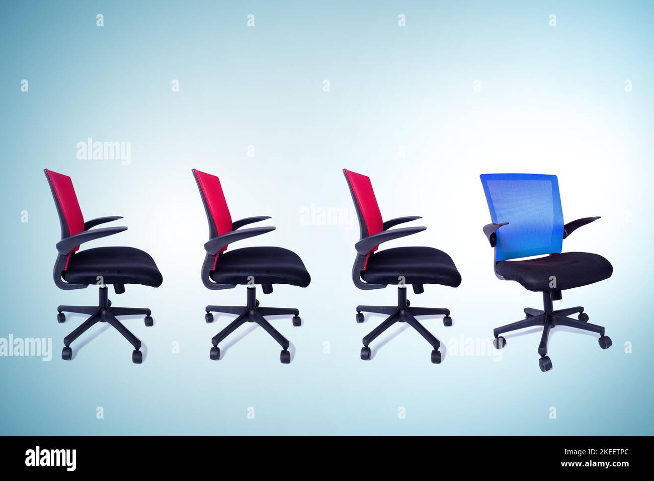 Office chairs in the promotion concept Stock Photo - Alamy