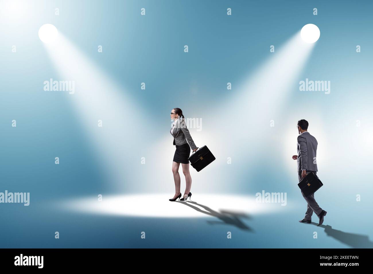 Business people under the spotlight concept Stock Photo - Alamy