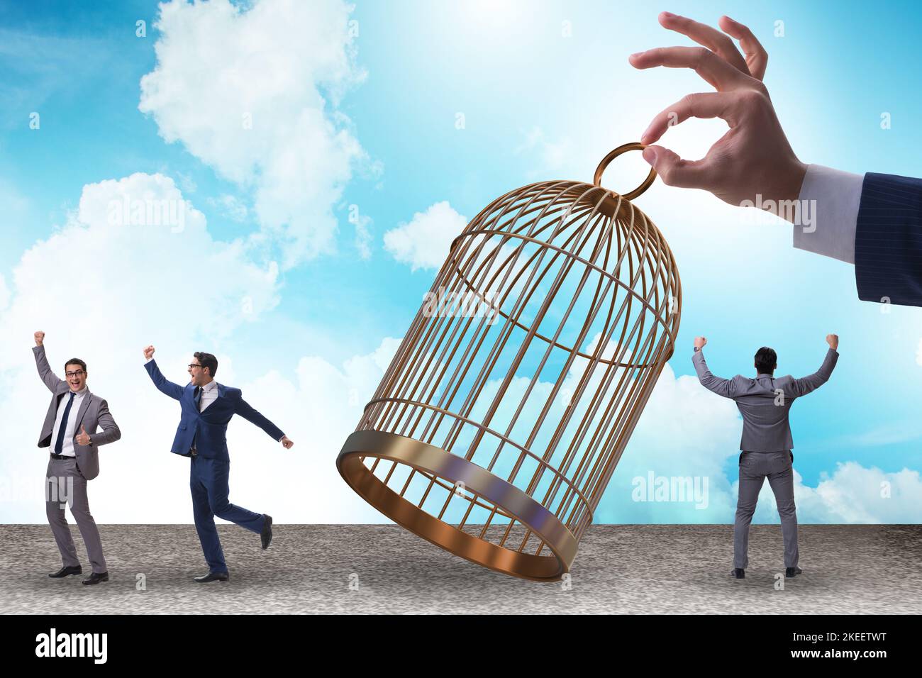 Business people and the golden cage concept Stock Photo - Alamy