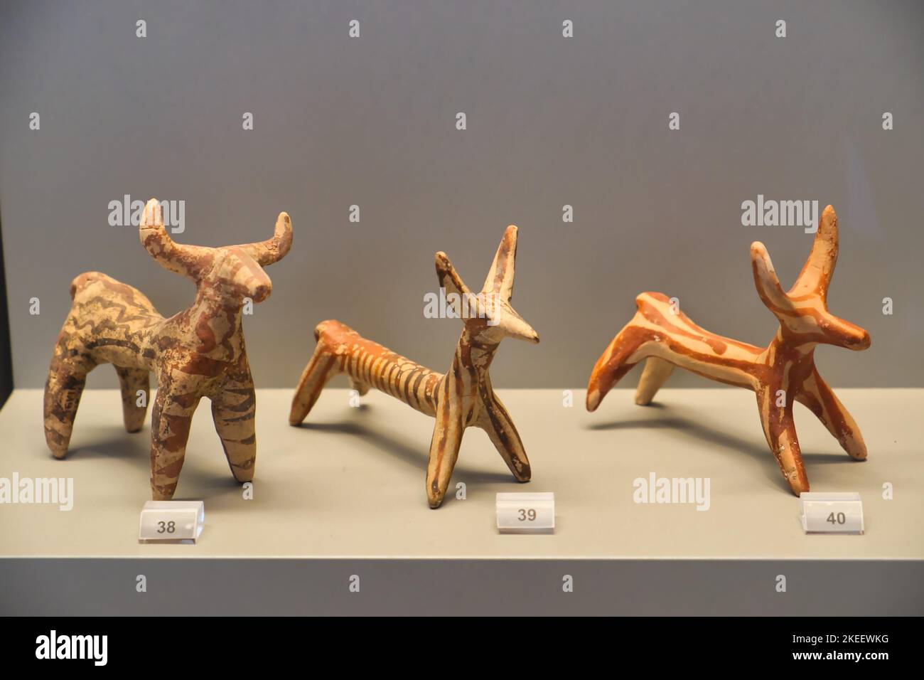 Close up on small ceramic bulls at the Archaeological Museum in Athens ...