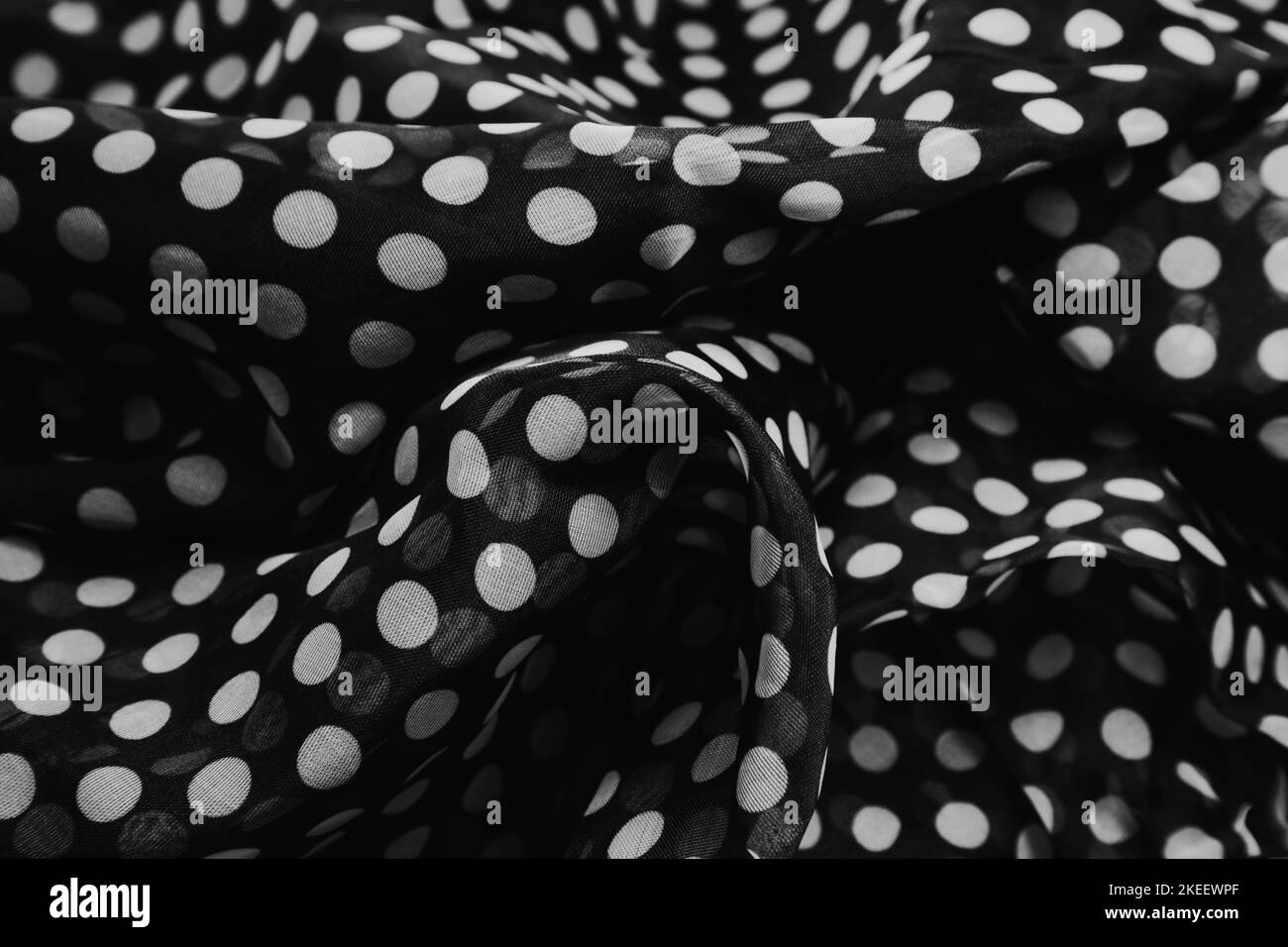 Gathered and folded texture of black and white color polka dot printed ...