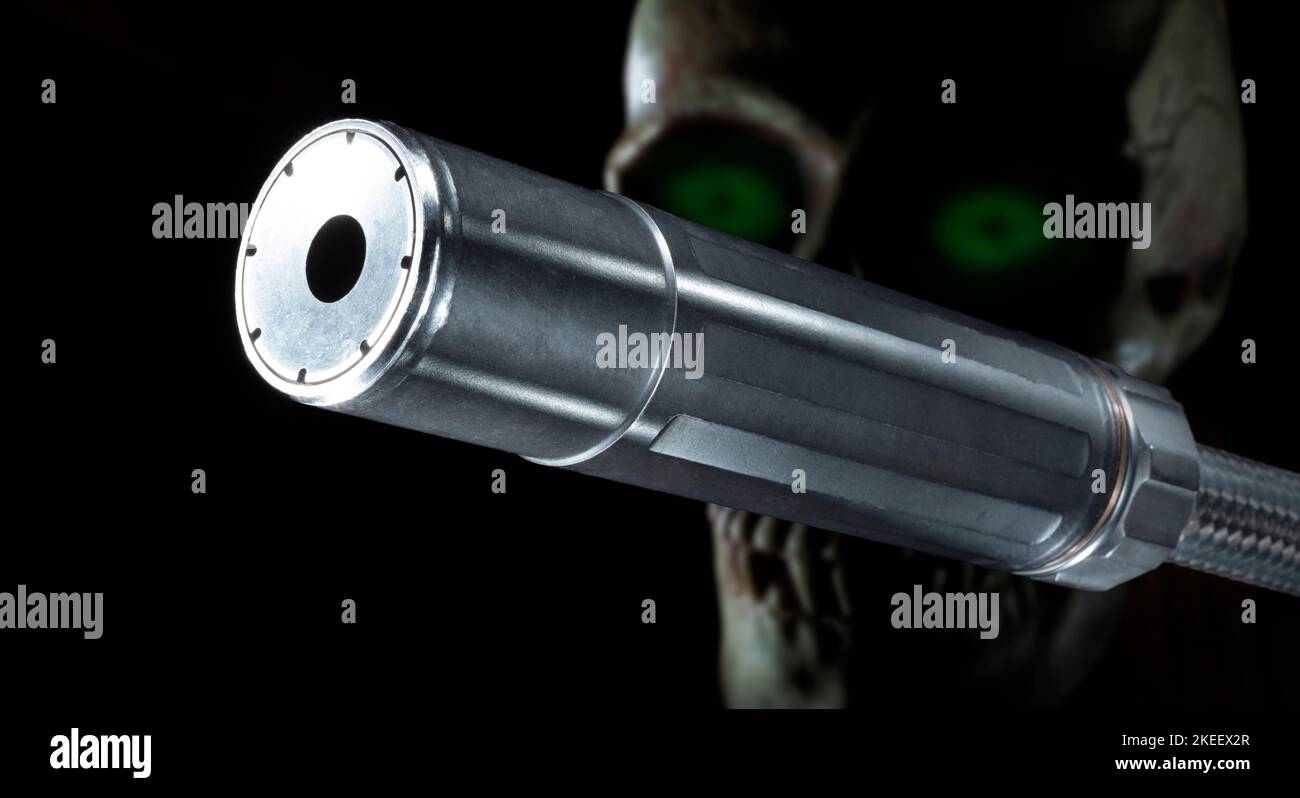 Scary skull behind a rifle silencer on a dark background Stock Photo ...