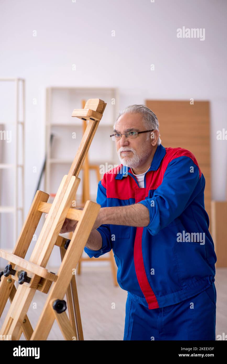 Old carpenter repairing drawing easel Stock Photo - Alamy