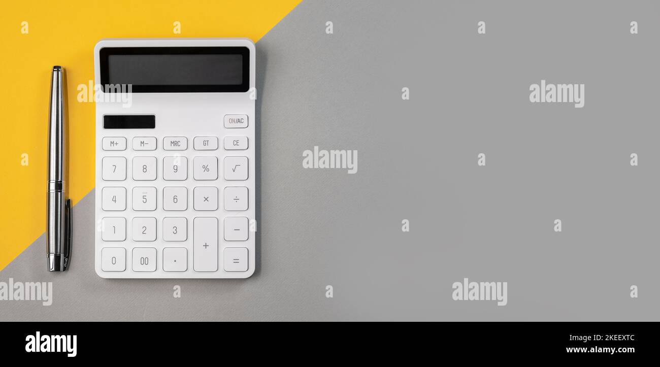 Calculator on business banner with copy space for text Stock Photo - Alamy