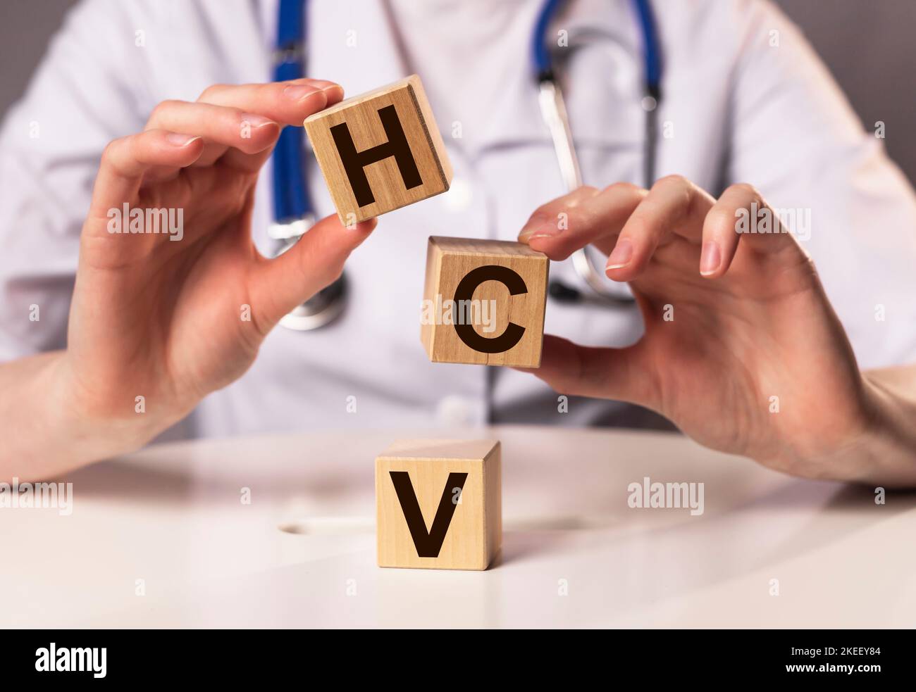 HCV acronym for medical test. Word on cubes Stock Photo - Alamy