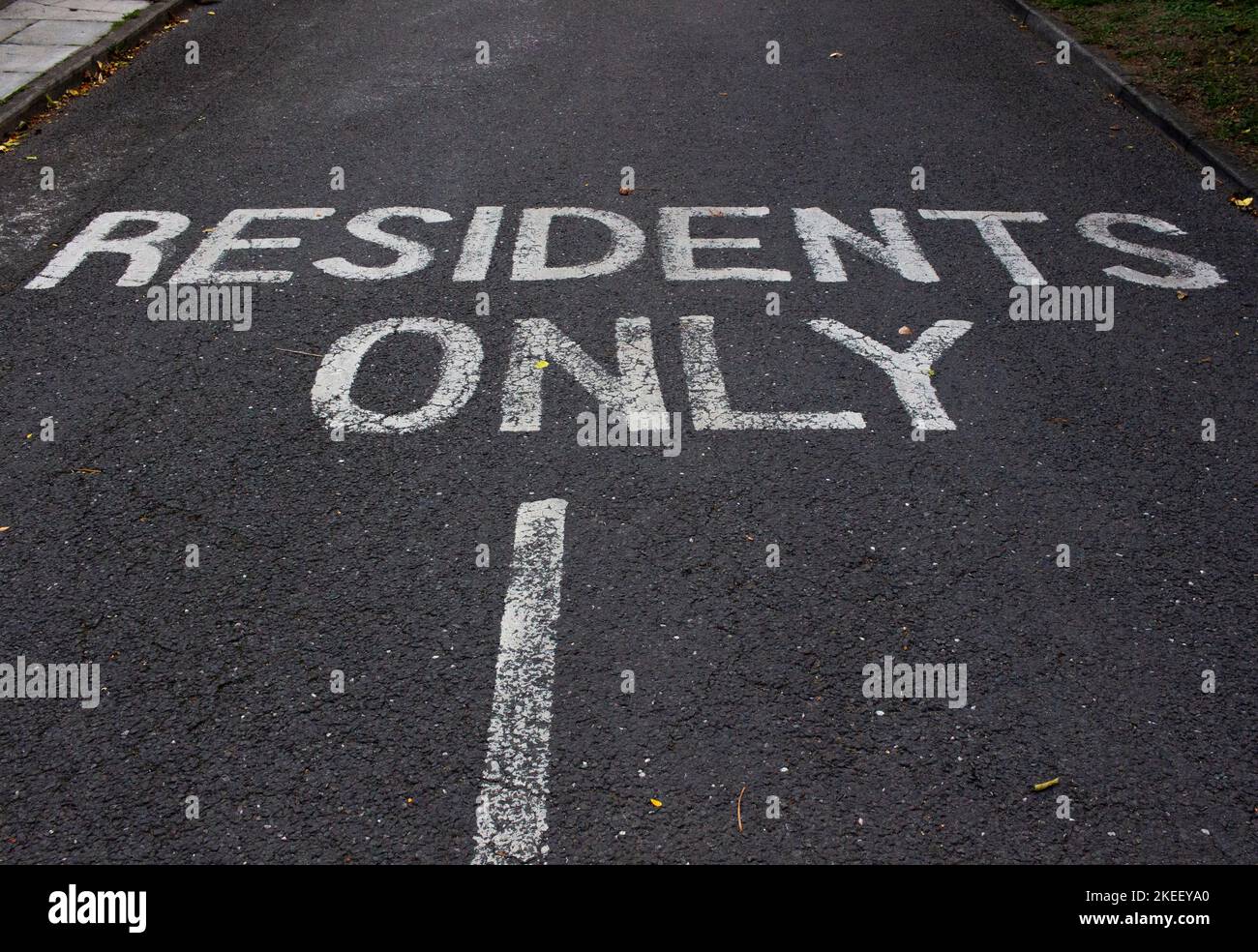 Sign 'Residents Only' painted on tarmac in London street, a private ...