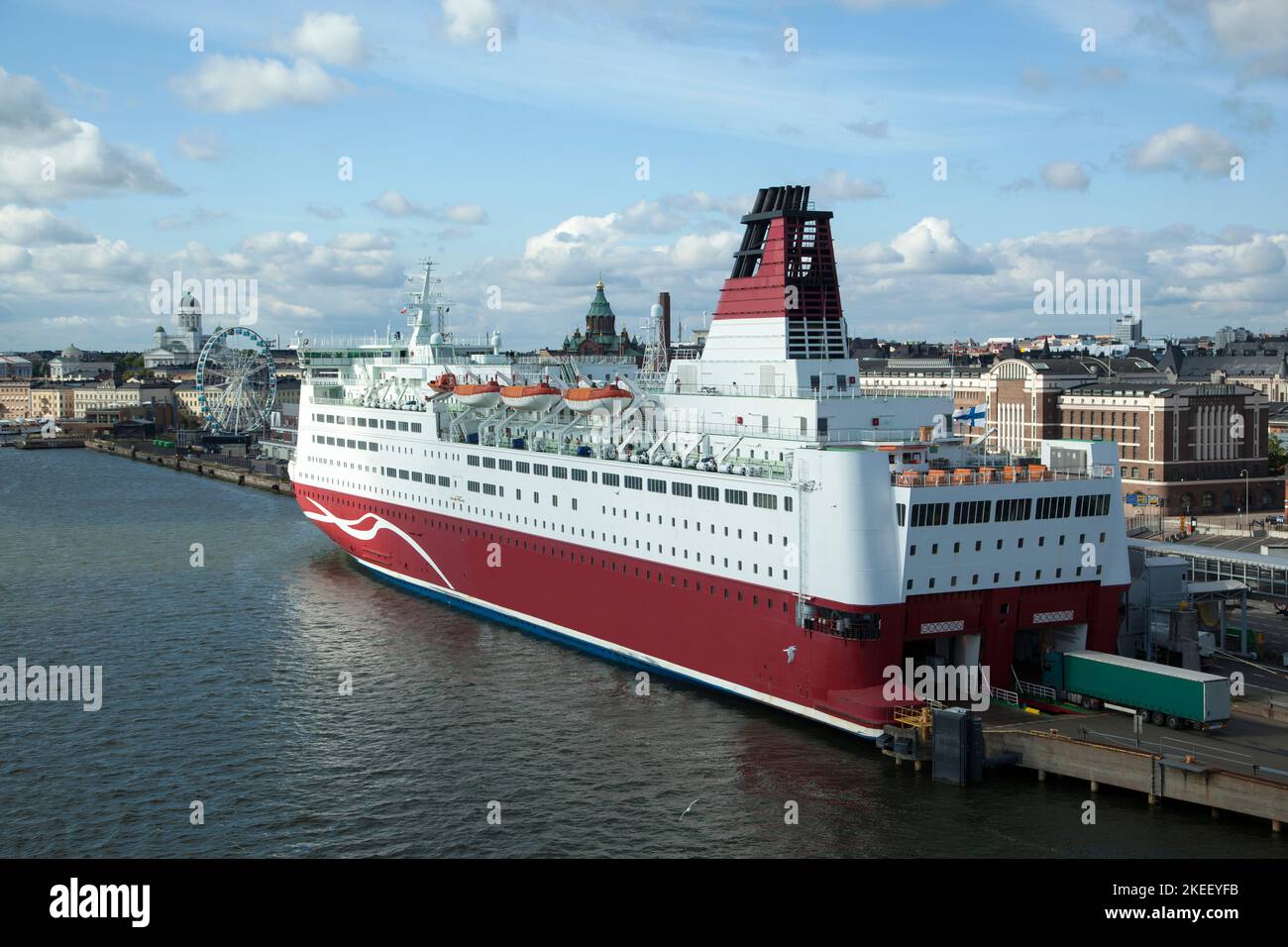 The aerial view of a ferry ship getting loaded by a truck in Helsinki ...