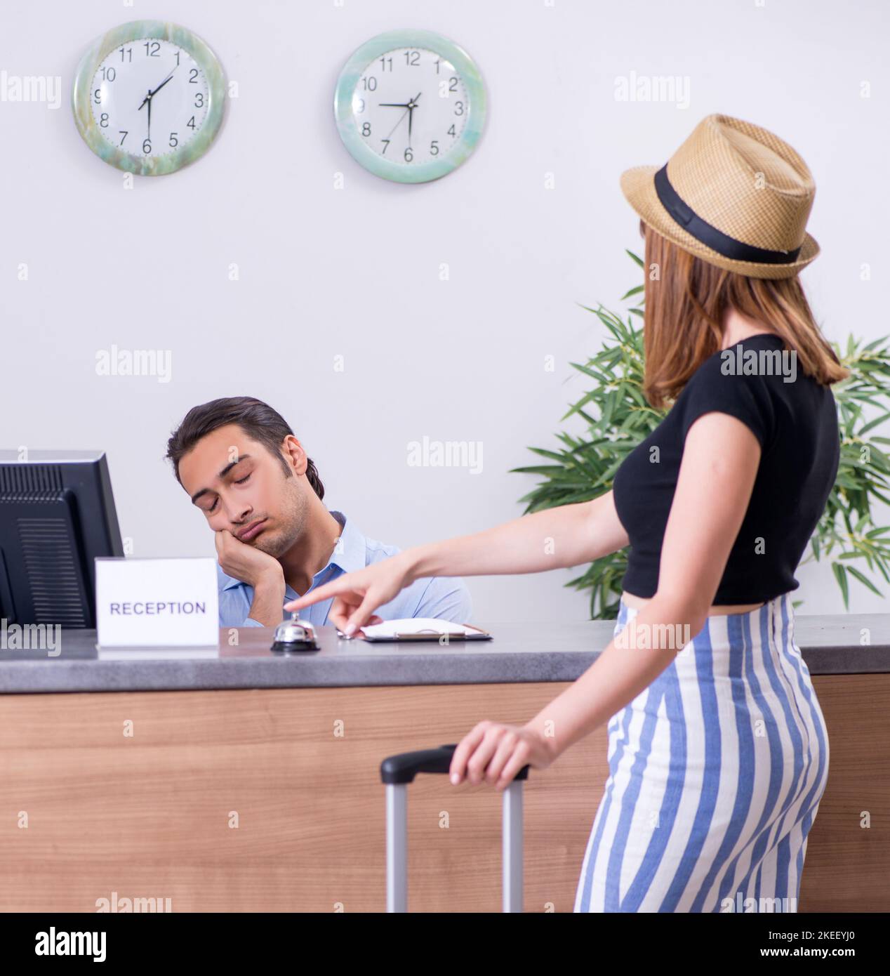 Hotel receptionist funny hi-res stock photography and images - Alamy