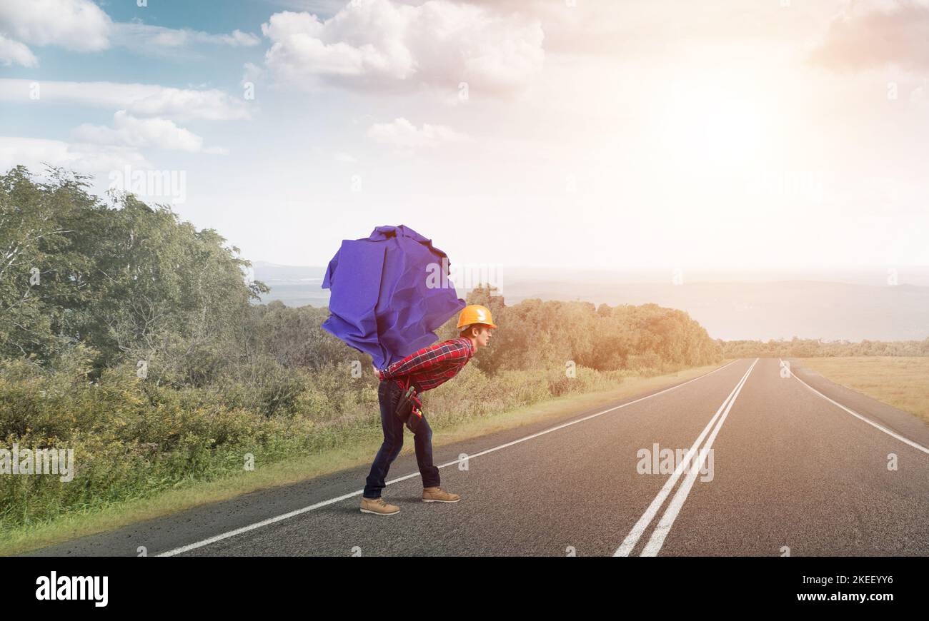 Engineer man carry load Stock Photo - Alamy
