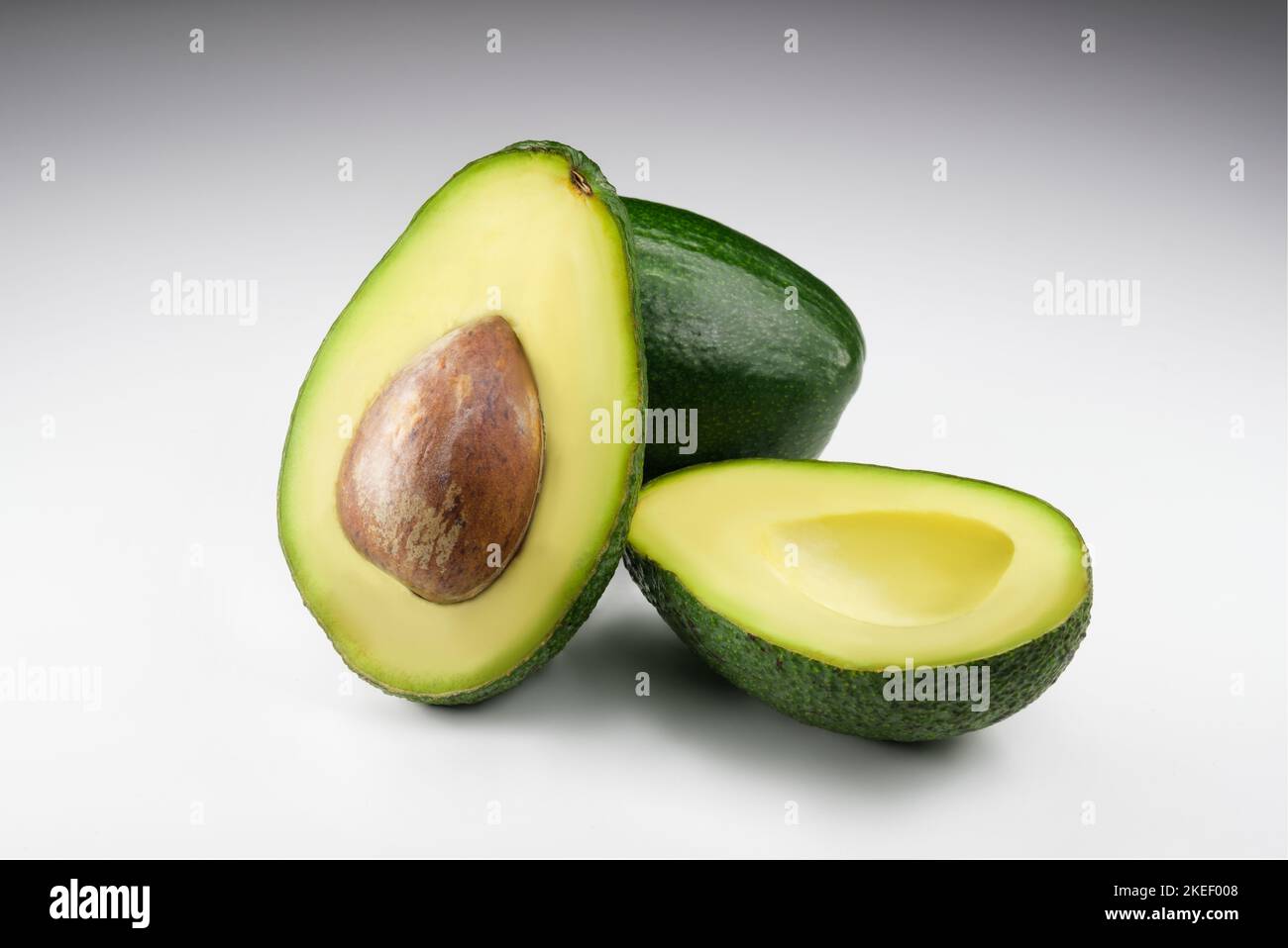 Still life shot of Two avocados on a white background Stock Photo - Alamy