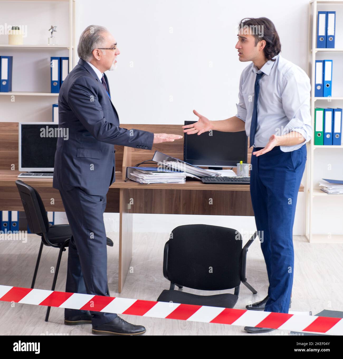 The forensic investigator investigating theft in the office Stock Photo ...