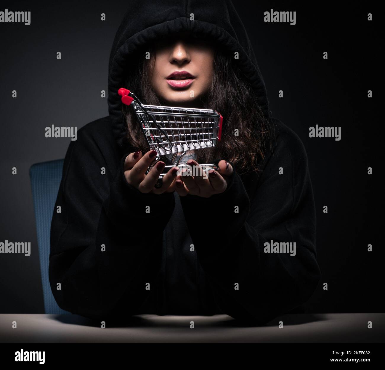 The female hacker hacking security firewall late in office Stock Photo ...