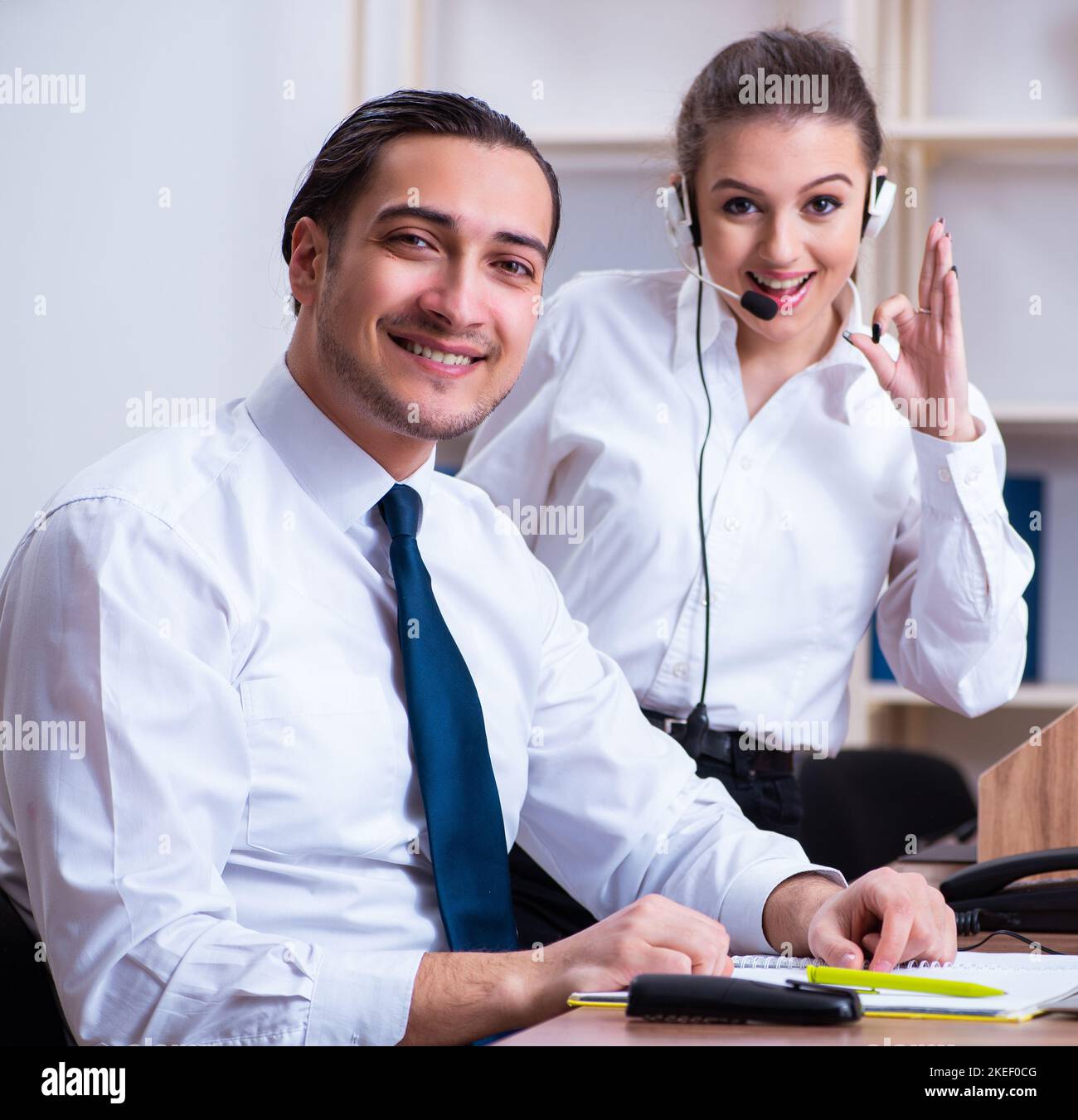 The call center operators working in the office Stock Photo - Alamy