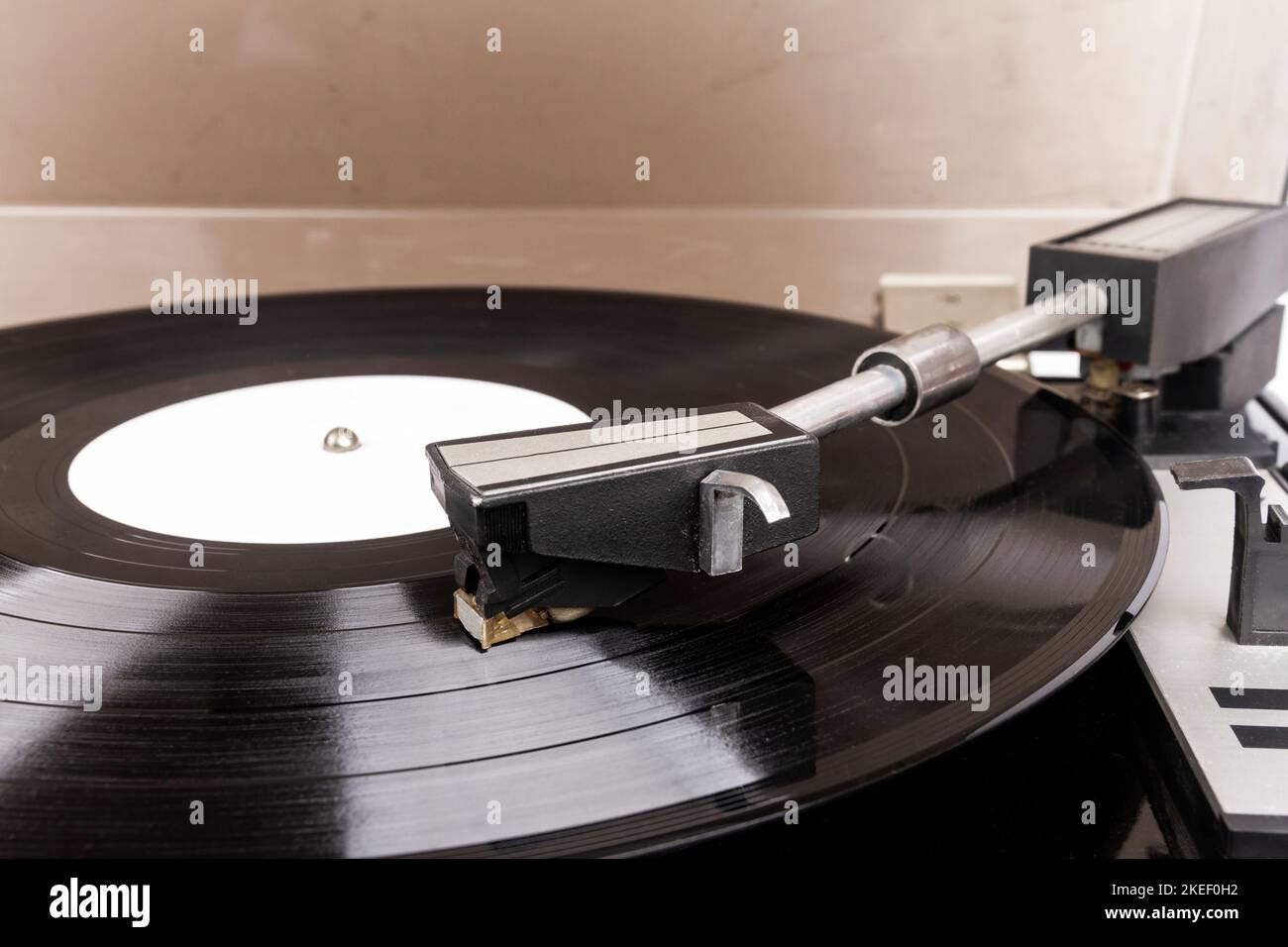 Close up of turntable needle on a vinyl record. Turntable playing vinyl ...