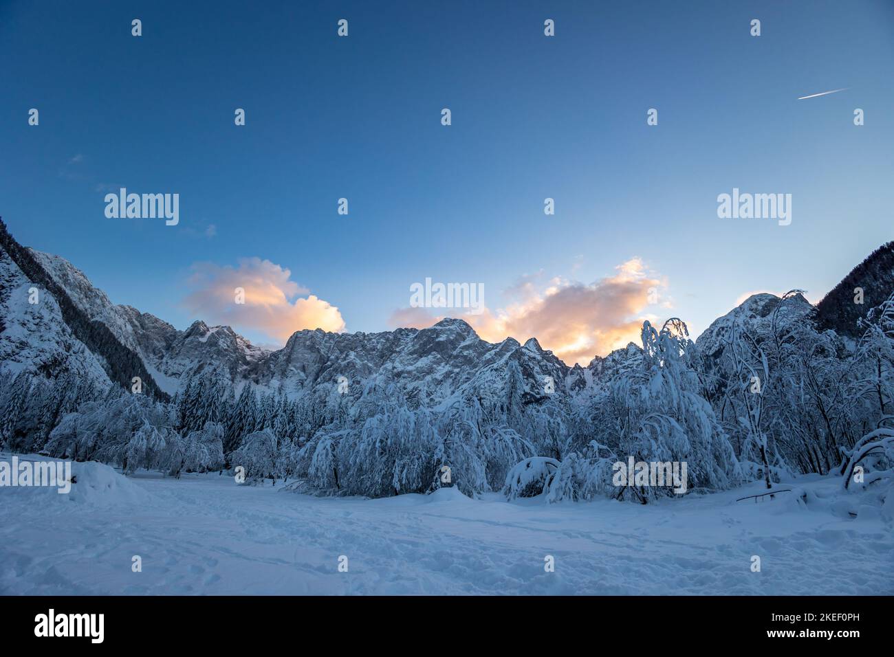 Frosty winter sunset at the lakes of Fusine, Friuli Venezia Giulia ...