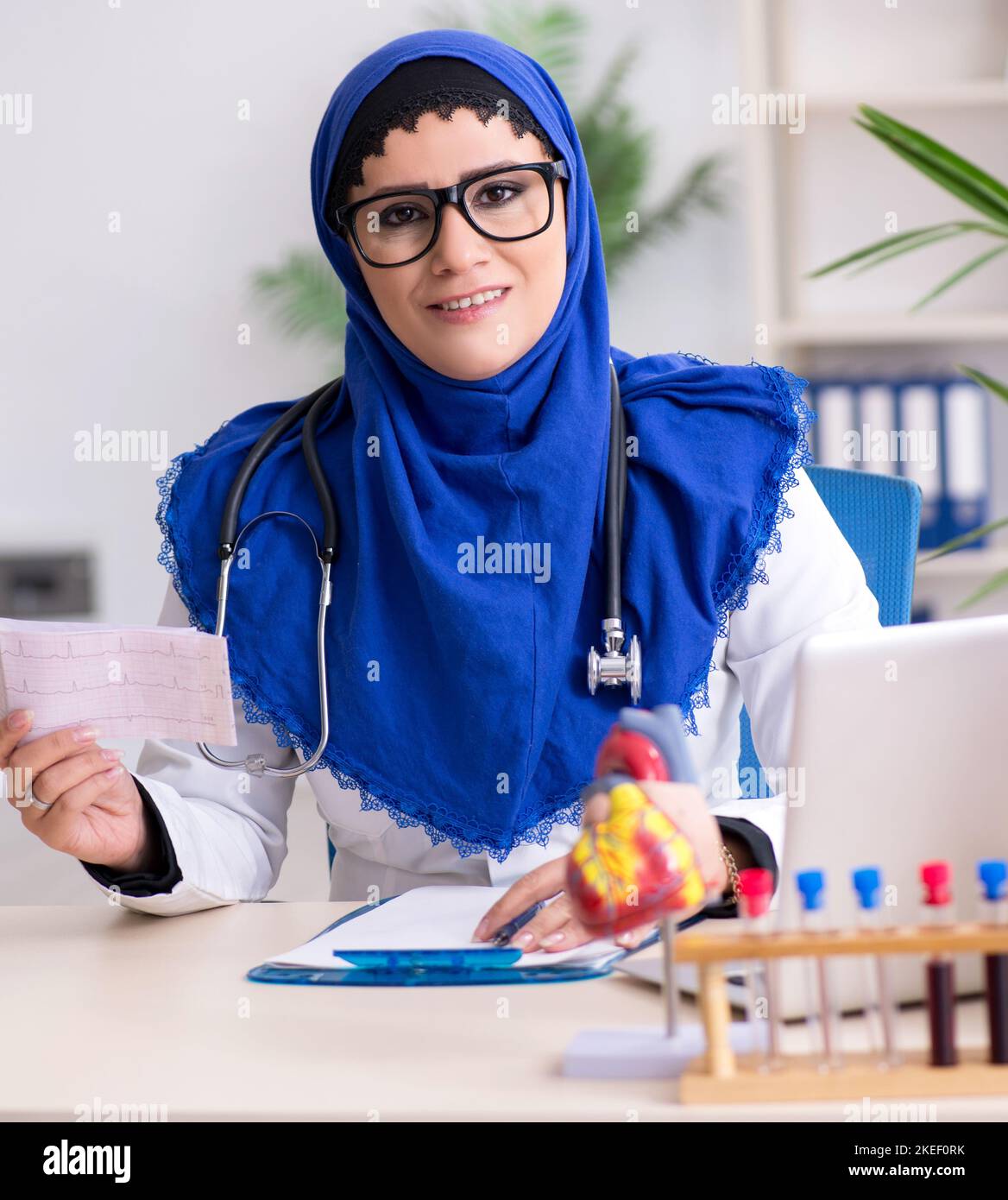 The female doctor in hijab working in the hospital Stock Photo - Alamy