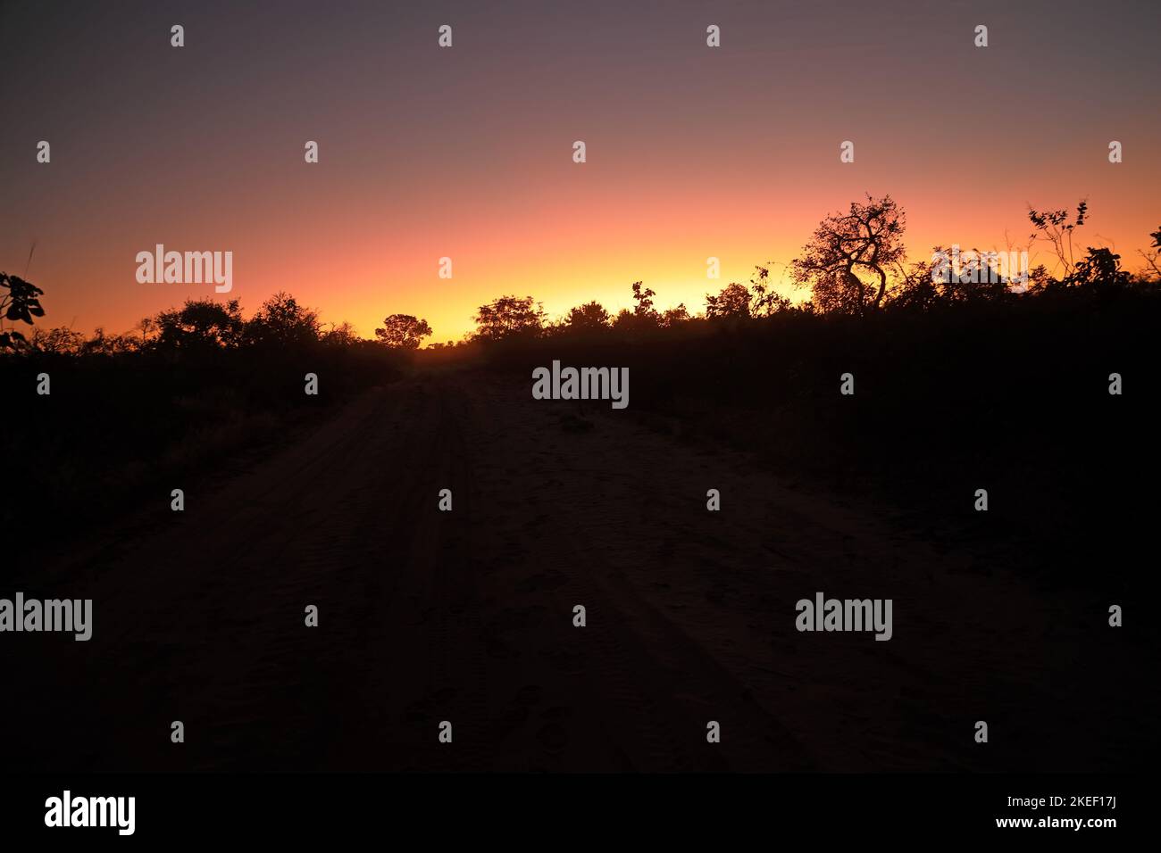 Dawn over dirt road hi-res stock photography and images - Alamy