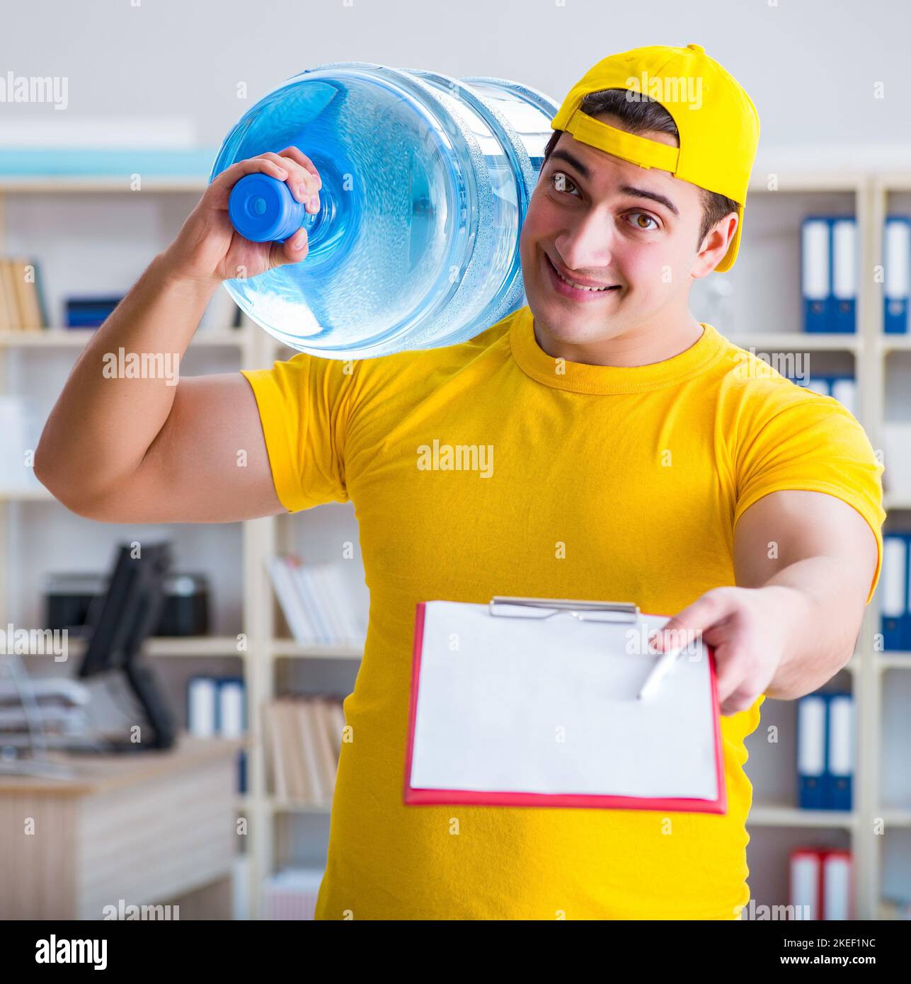 The man delivering water bottle to the office Stock Photo - Alamy