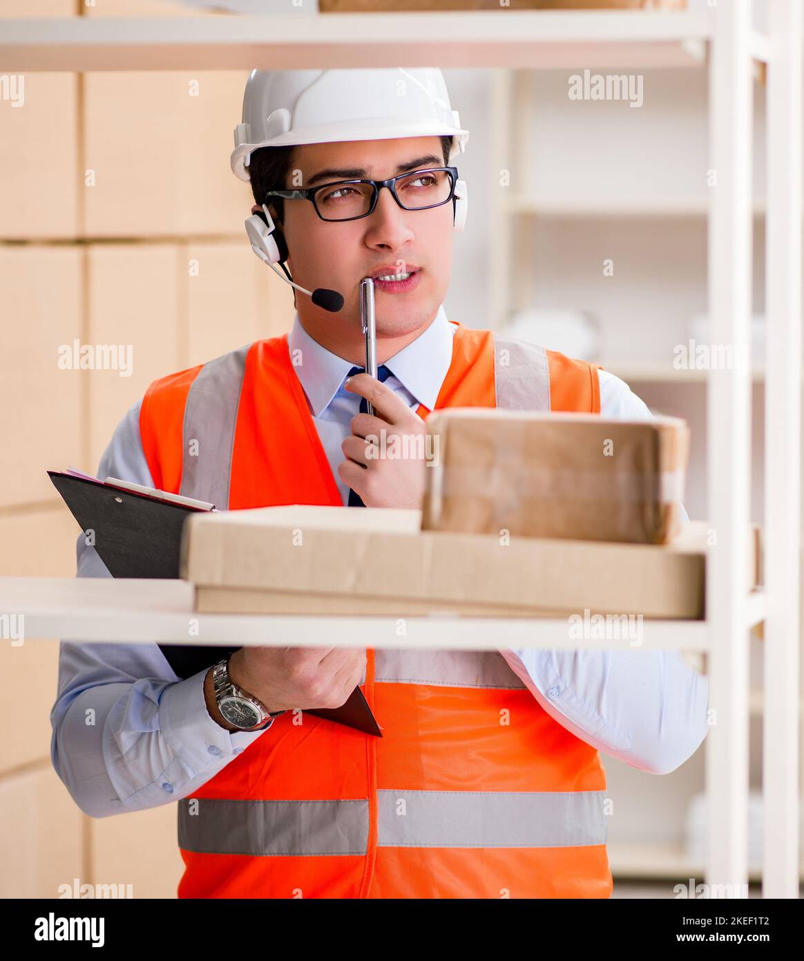 The man working in postal parcel delivery service office Stock Photo ...