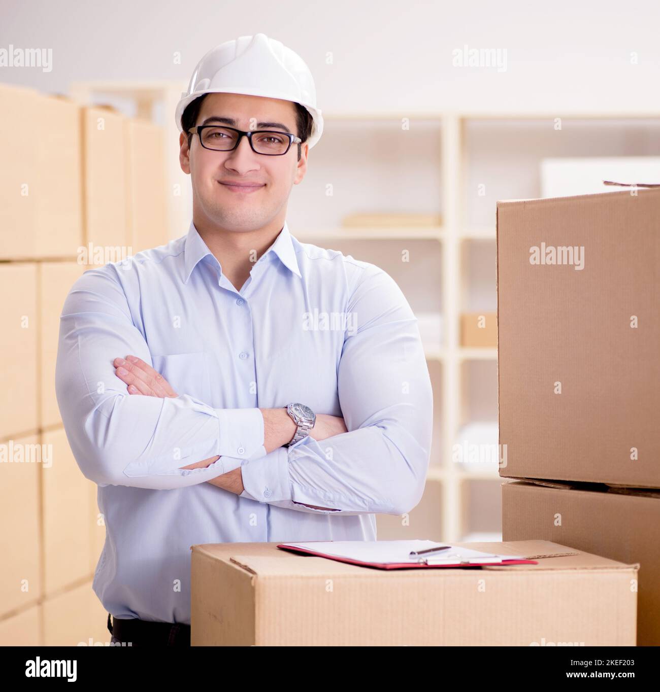 The man working in box delivery relocation service Stock Photo - Alamy