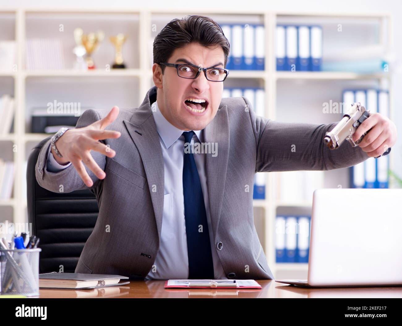 The angry aggressive businessman in the office Stock Photo - Alamy