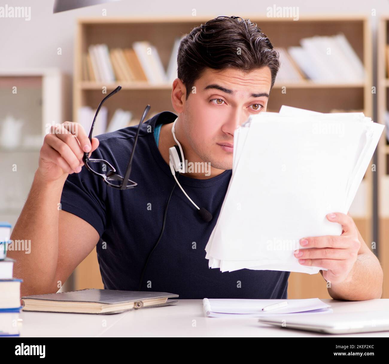 The angry man with too much paperwork to do Stock Photo - Alamy