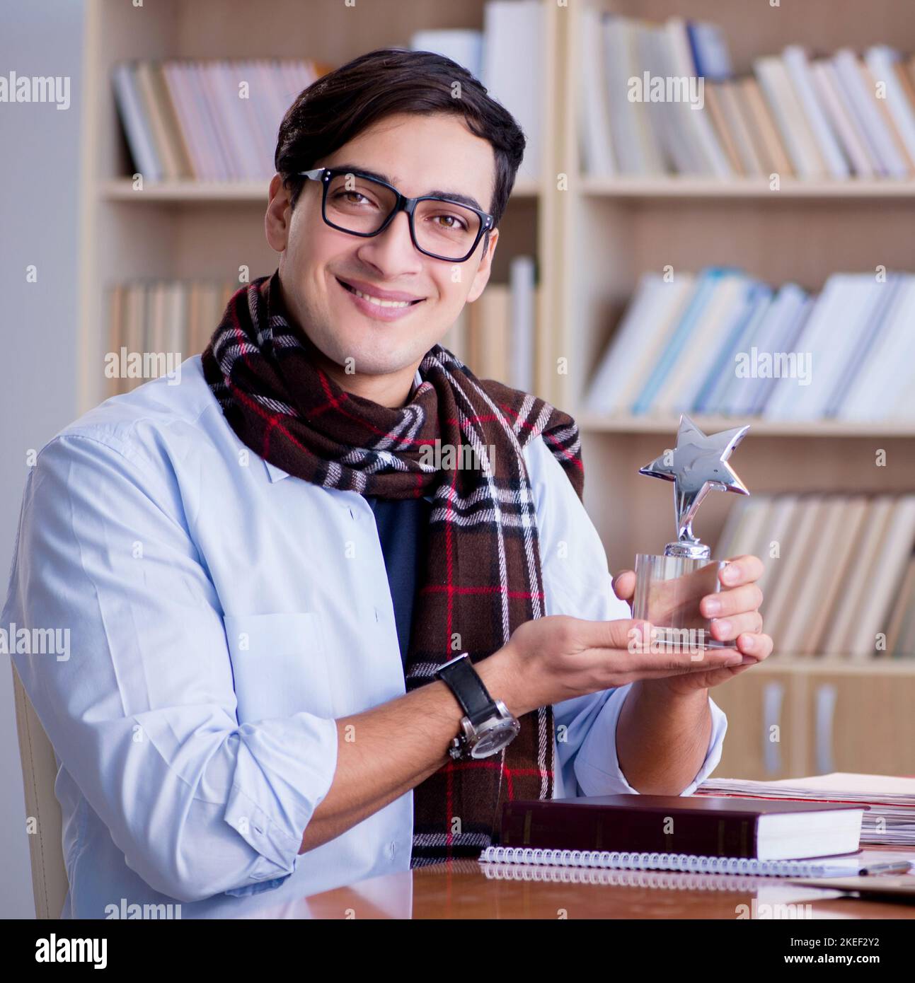 The young writer working in the library Stock Photo - Alamy