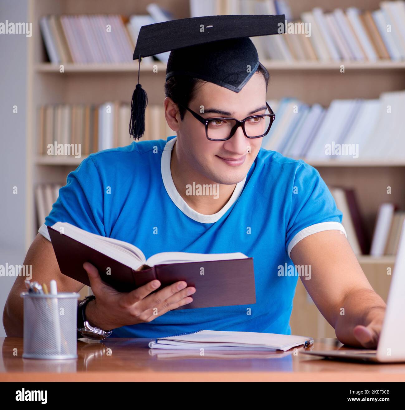 The young man graduating from university Stock Photo - Alamy