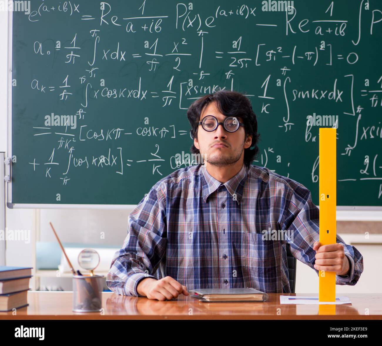 Angry teacher and ruler hi-res stock photography and images - Alamy