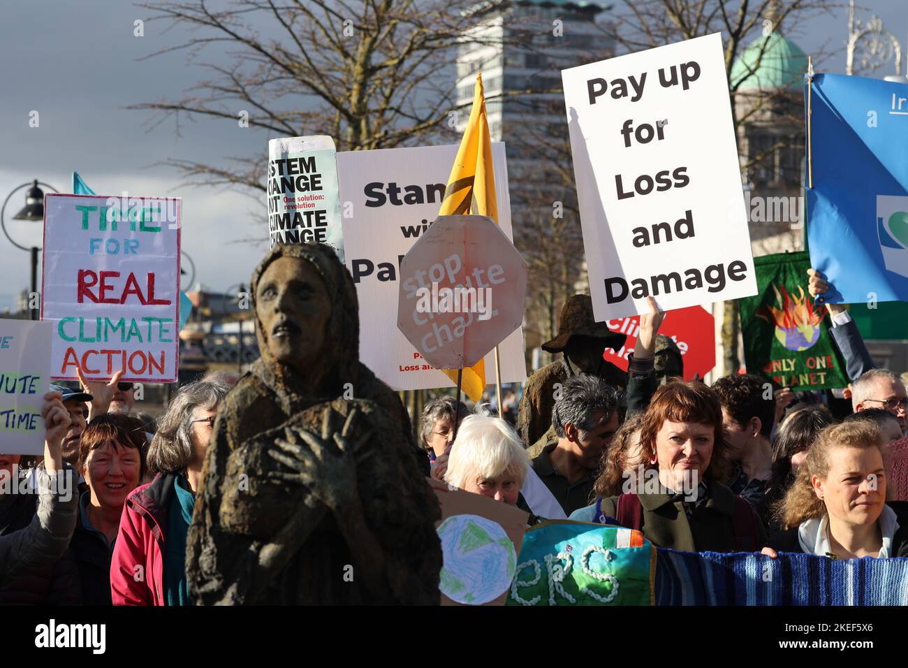 Campaigners hold a protest at the Irish Famine Memorial statues in the ...