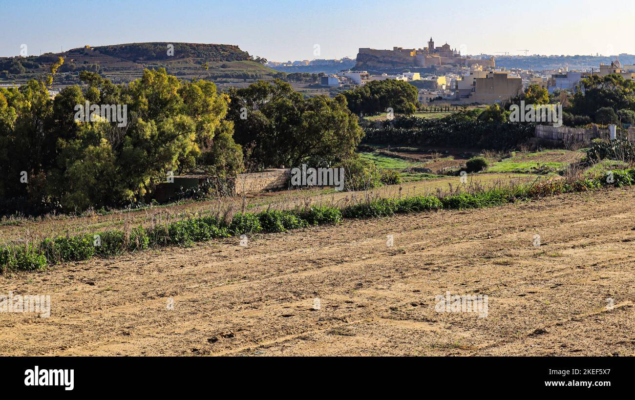 The Citadel from a distance with fields in the foreground, on the ...