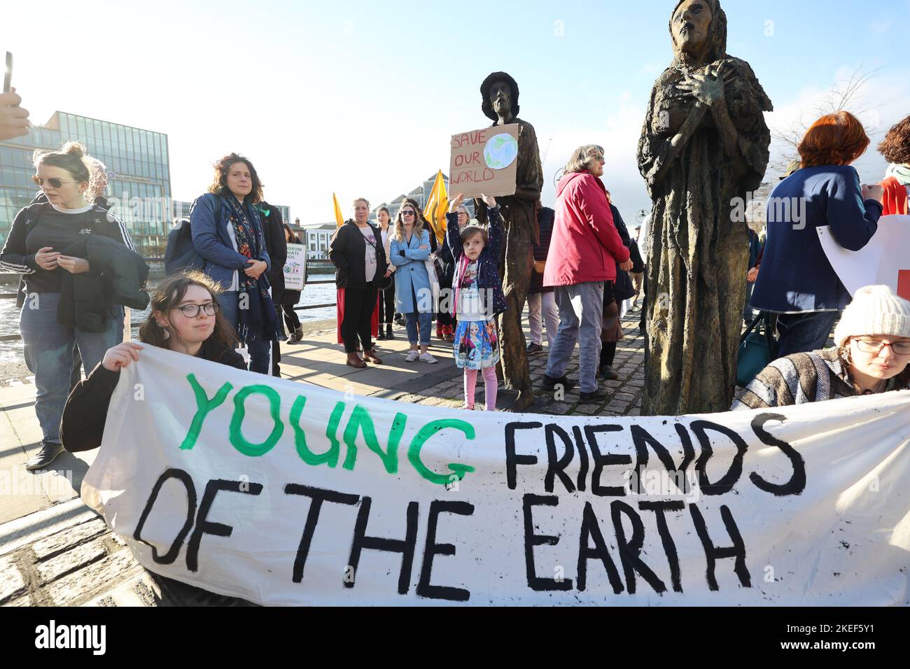 Campaigners hold a protest at the Irish Famine Memorial statues in the ...
