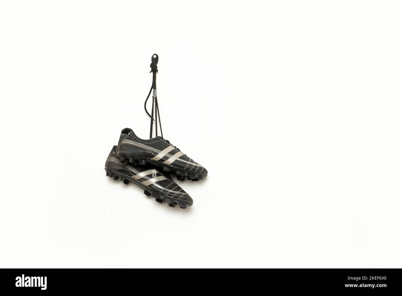 soccer spikes are hanging against isolated white background Stock Photo ...