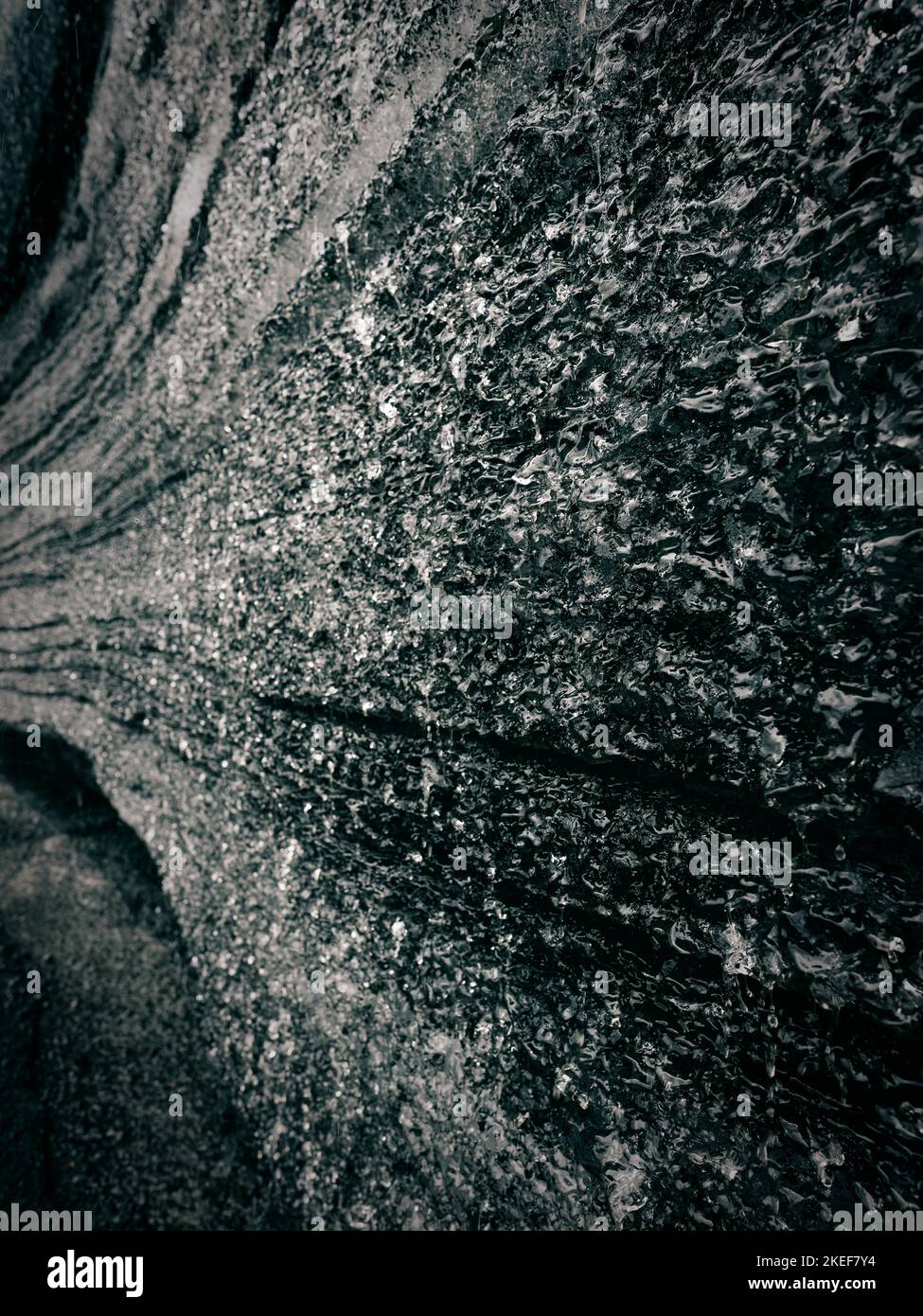 A minimalistic grayscale of the rock formations at the Katla volcano ...