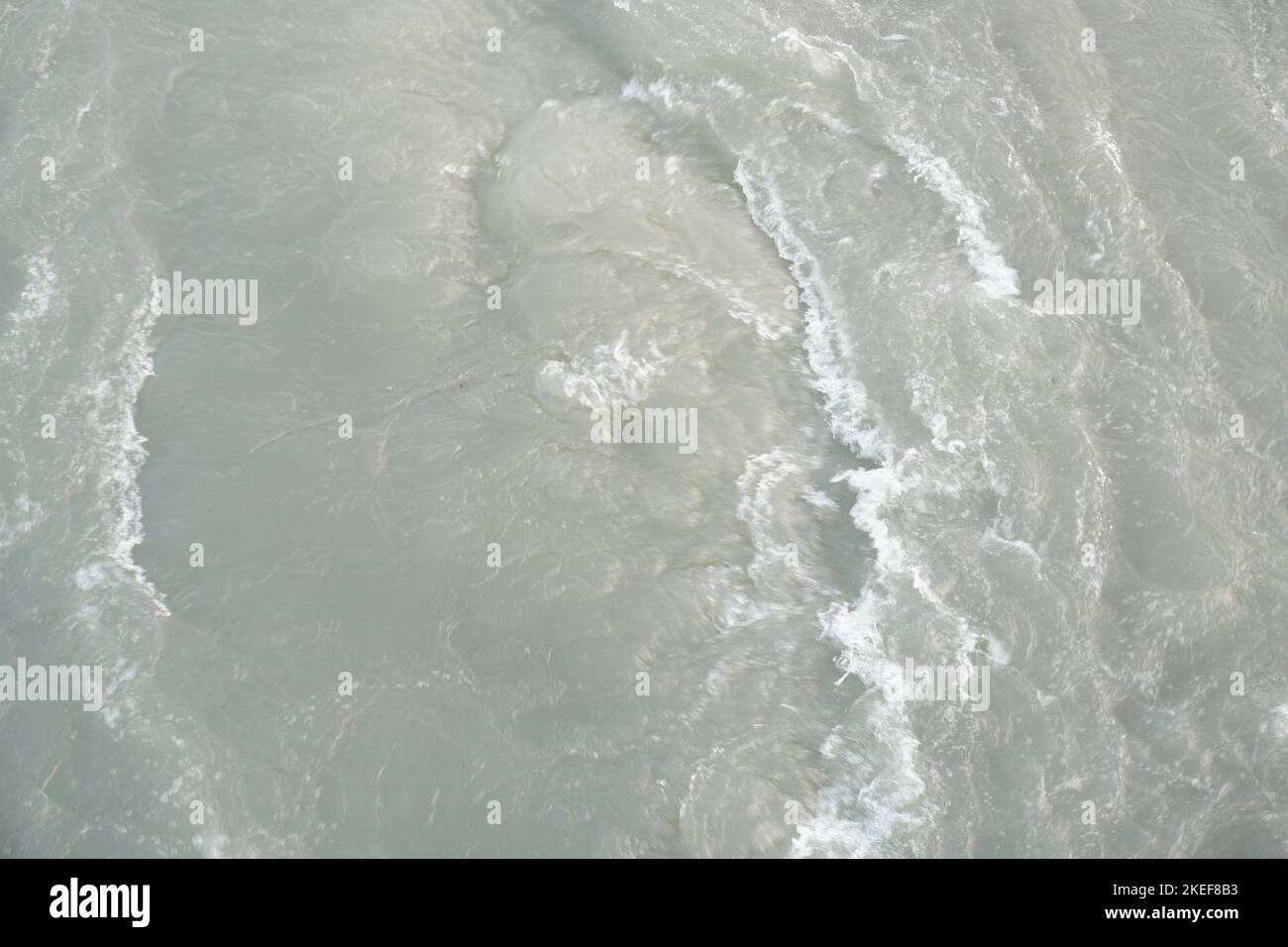 Fast moving whisky water on current stream river waves in the river ...