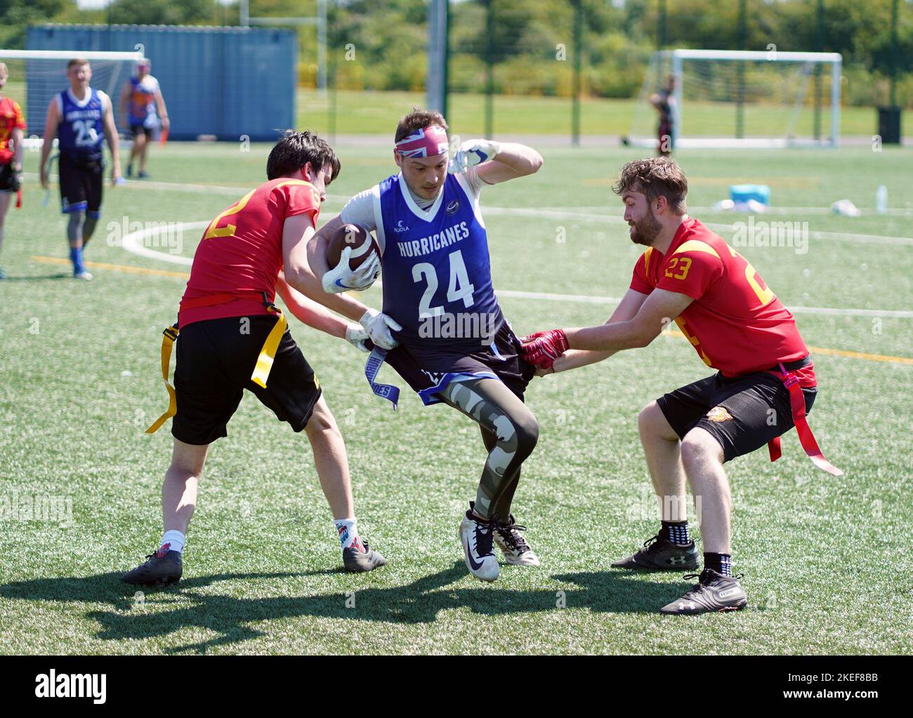 Tagging the flag in Flag Football Stock Photo - Alamy