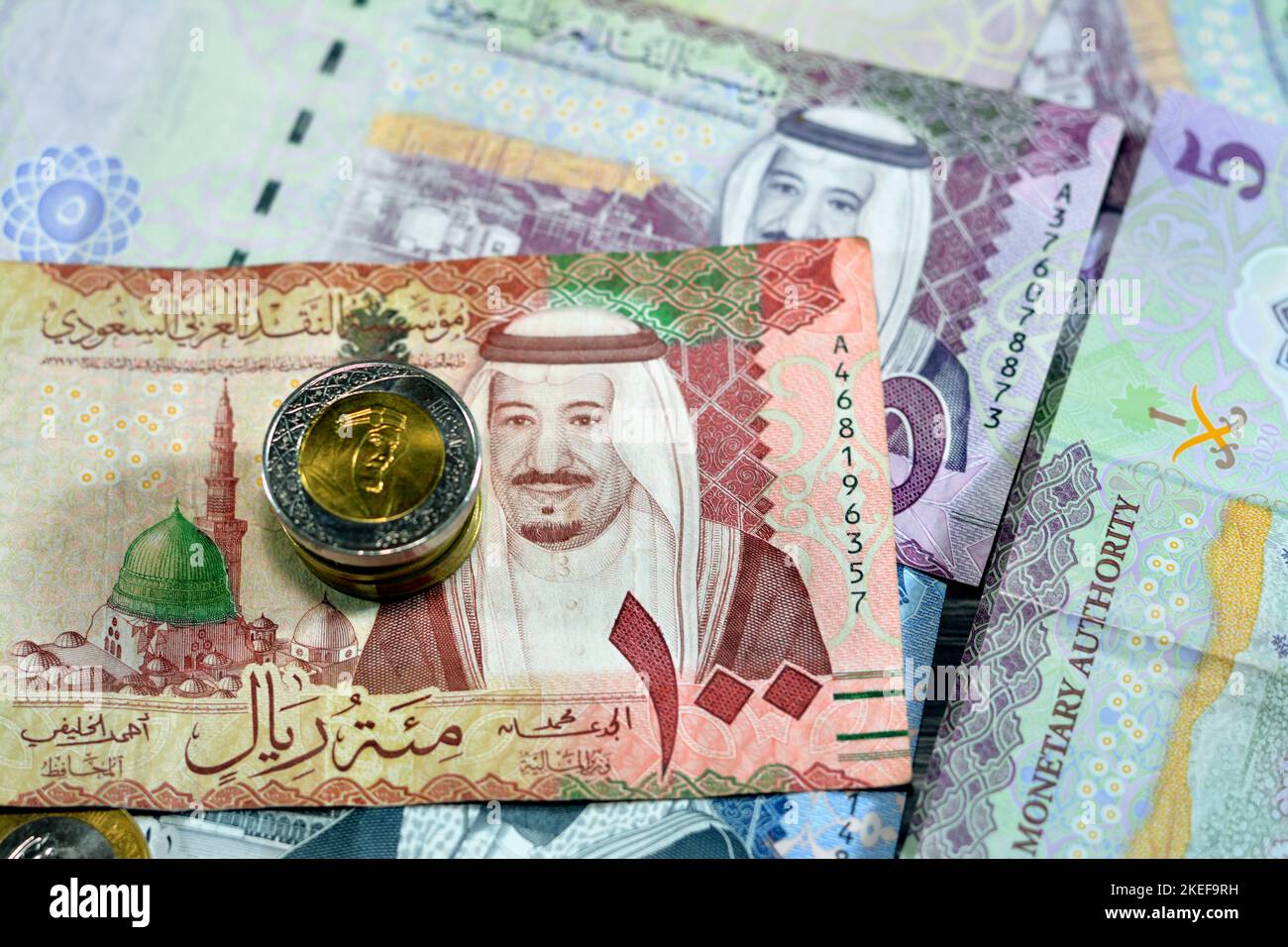 Saudi Arabia riyals money banknotes and coins, a pile of 500 SAR, 100 ...