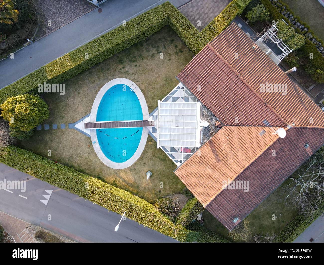 Drone view at a modern house with swimming pool Stock Photo - Alamy
