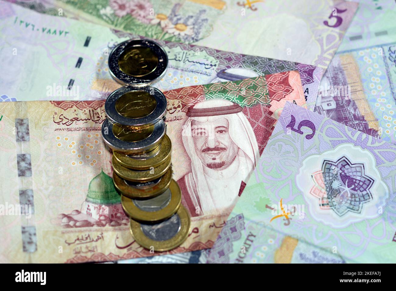 Saudi Arabia riyals money banknotes and coins, a pile of 500 SAR, 100 ...