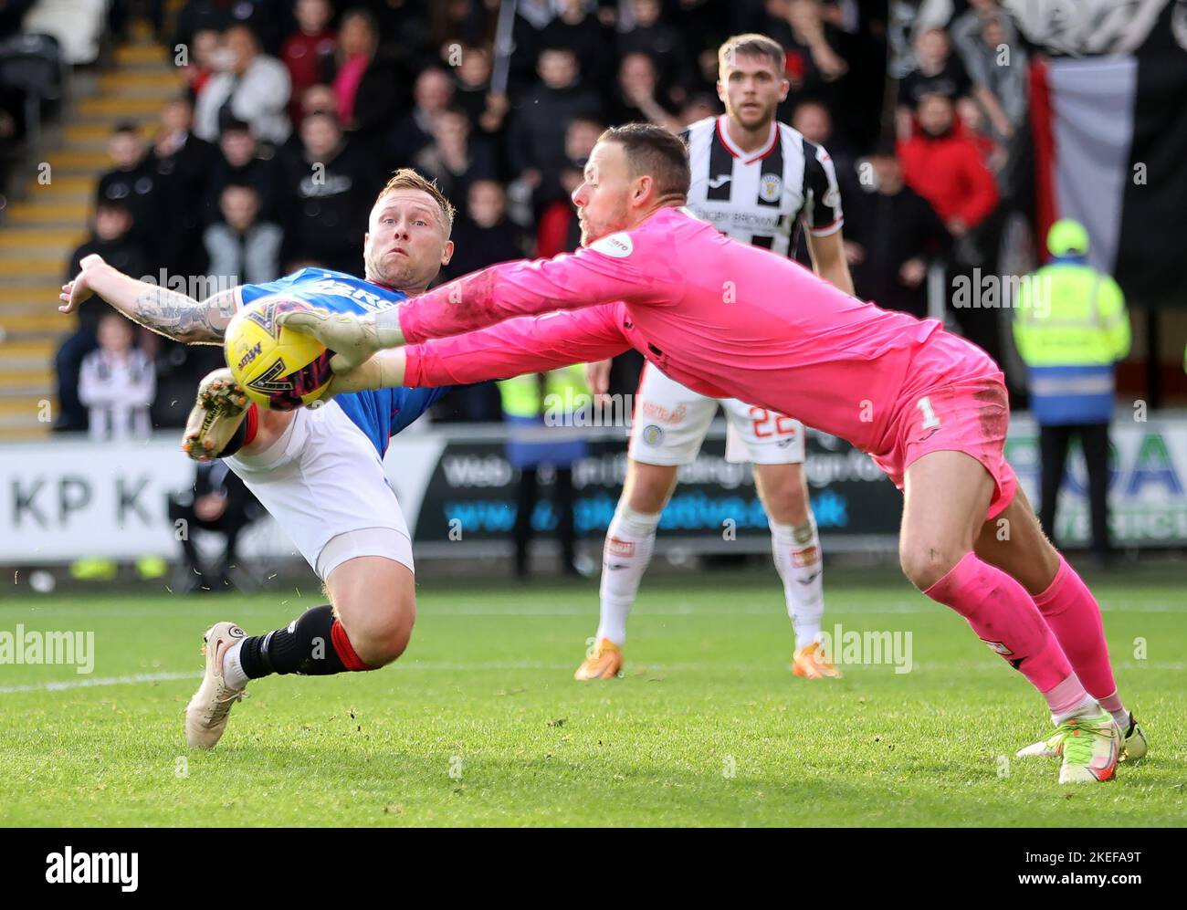 St Mirren goalkeeper Trevor Carson (right) saves a shot from Rangers ...