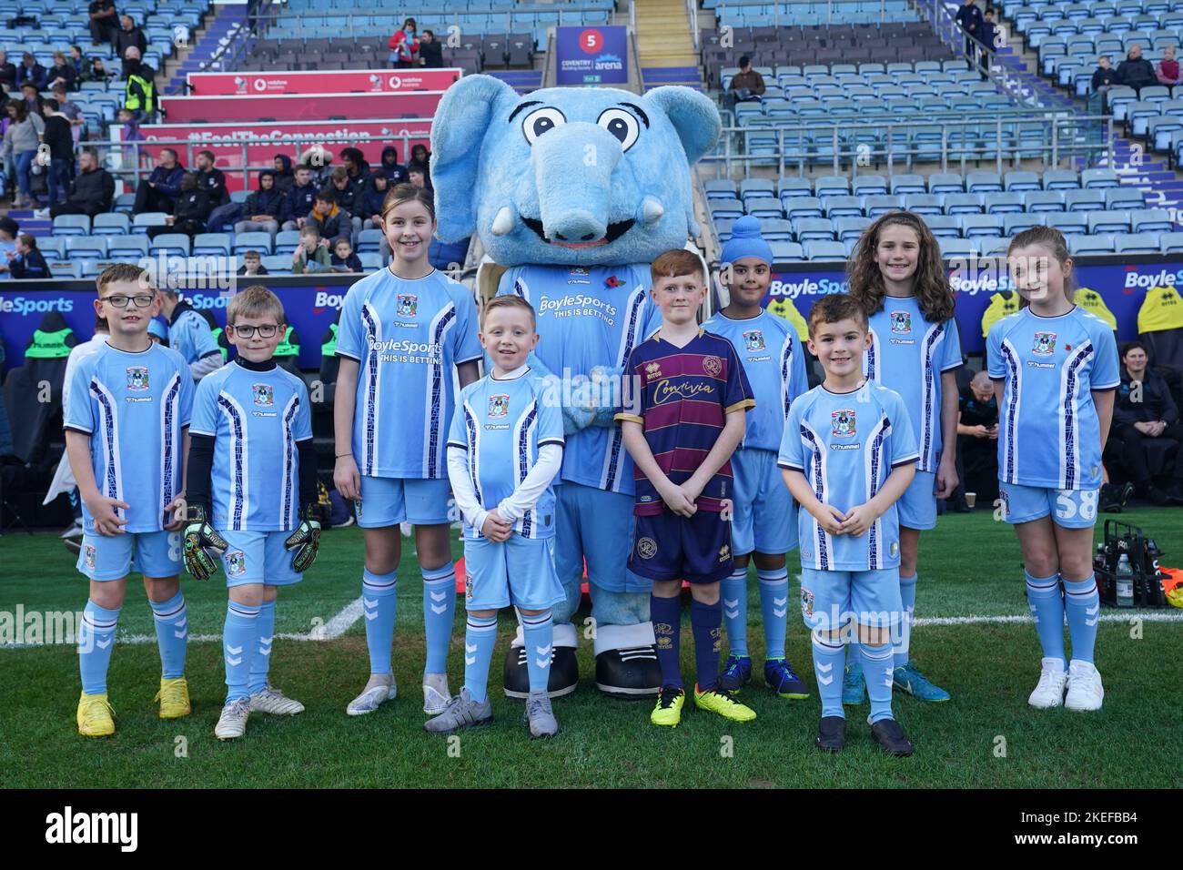 Coventry City match day mascots pose for a photo with Sky Blue Sam on ...