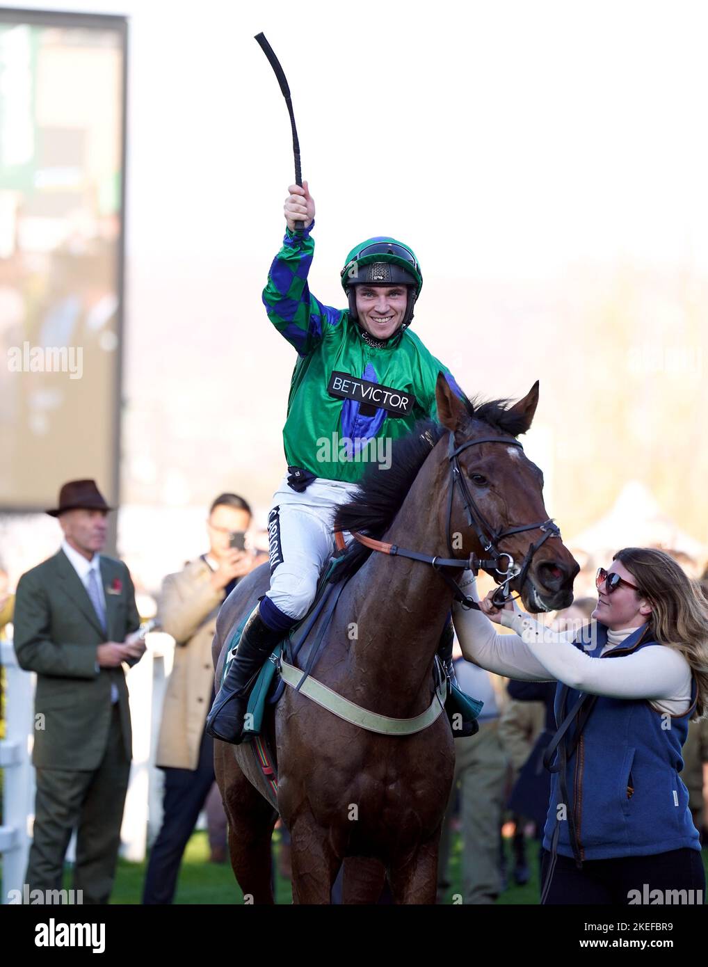 Ga Law and jockey Jonathan Burke after winning the Paddy Power Gold Cup ...