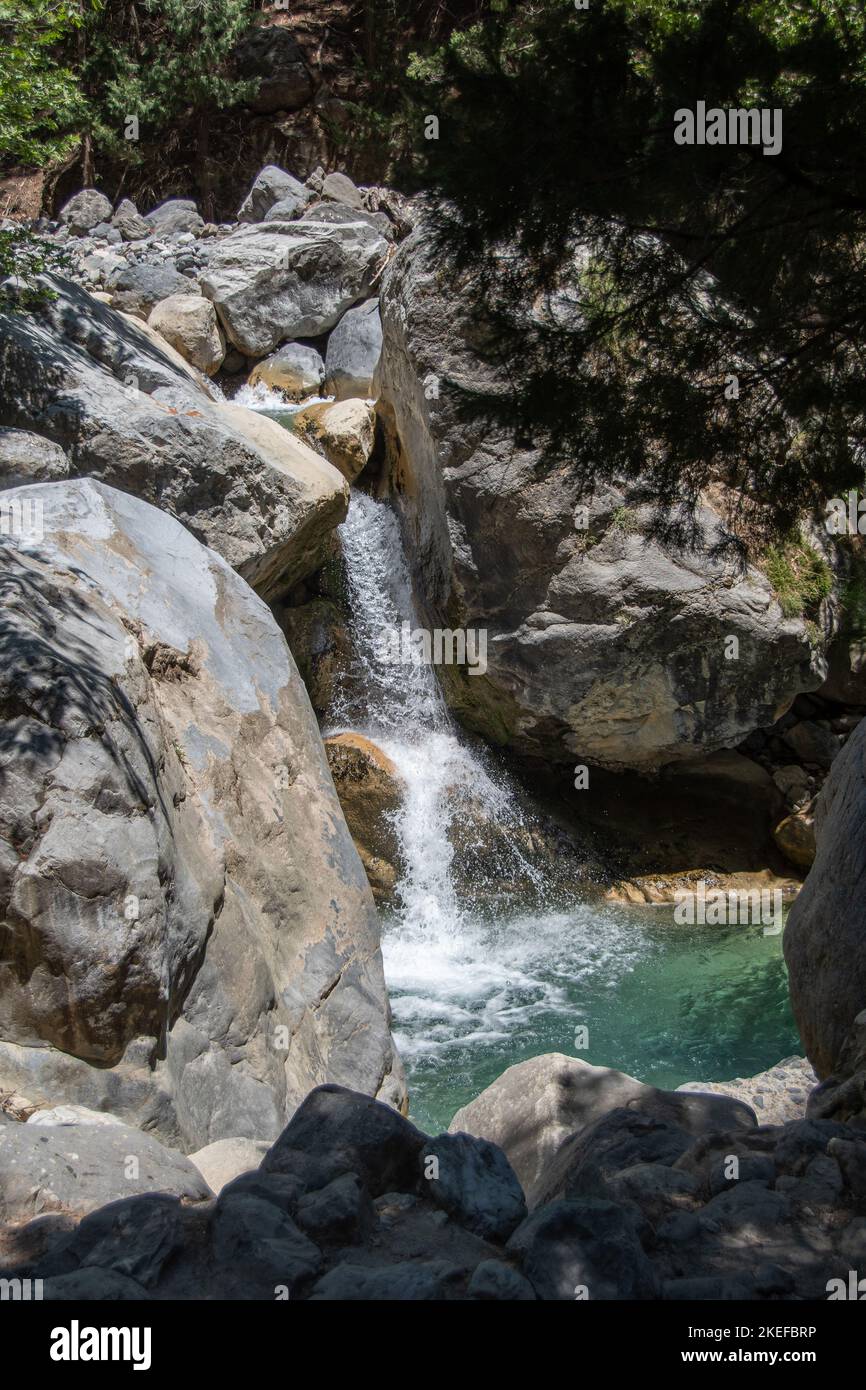 A small waterfall with clear water in Samaria Gorge on Crete Stock ...