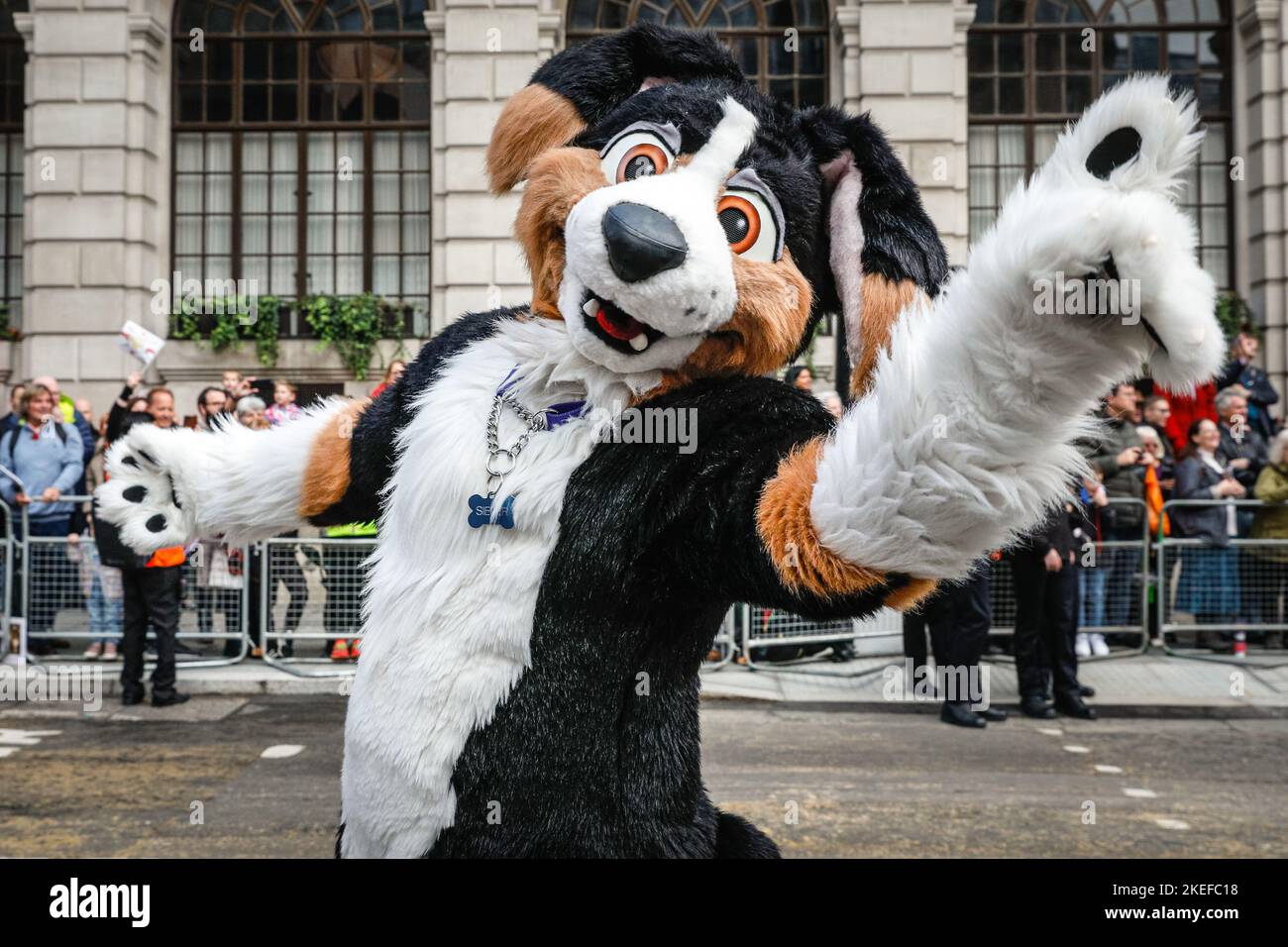London, UK. 12th Nov, 2022. A participant in furry costumes cheers up ...