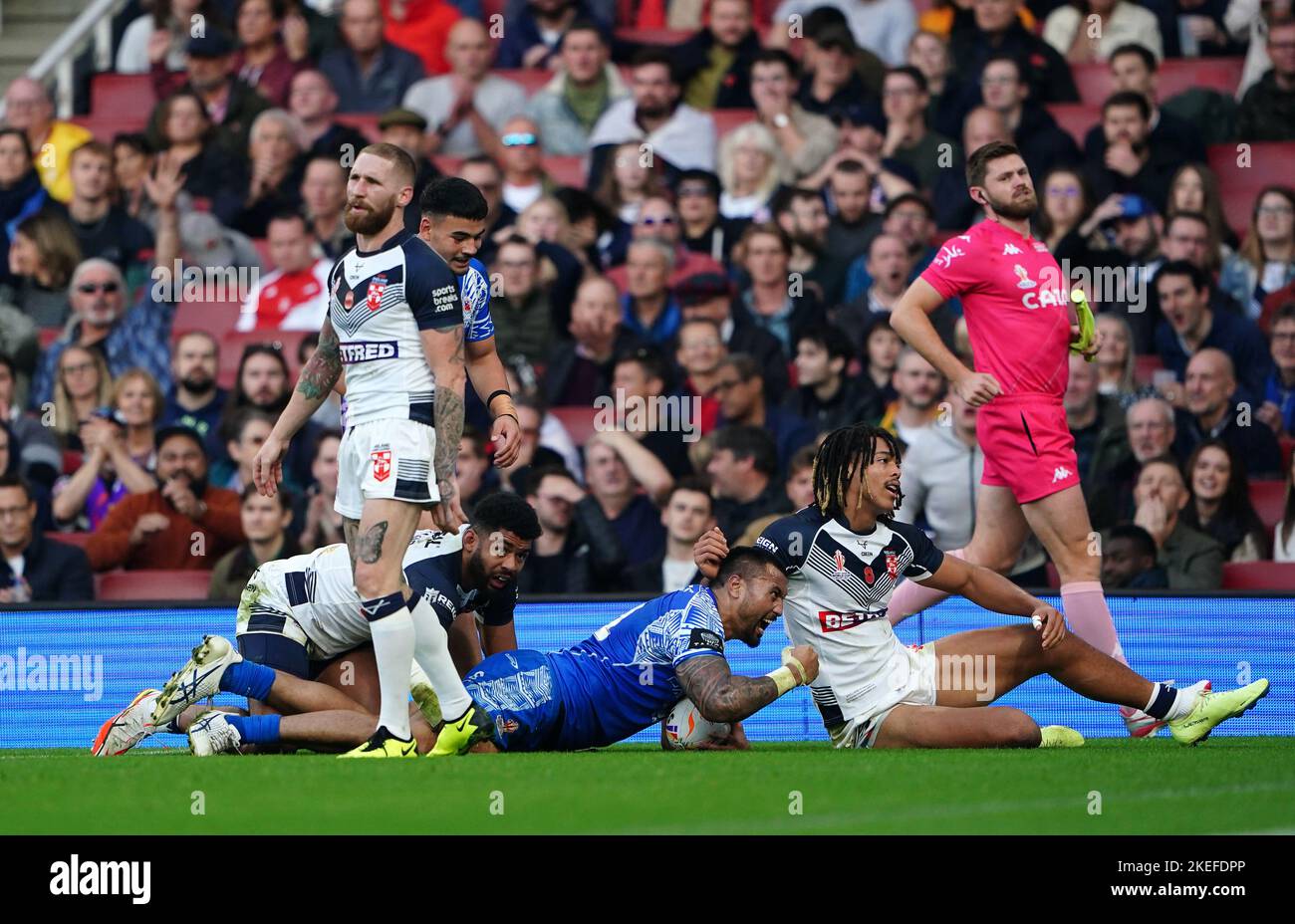 Samoa's Ligi Sao dives in to score his sides second try during the ...
