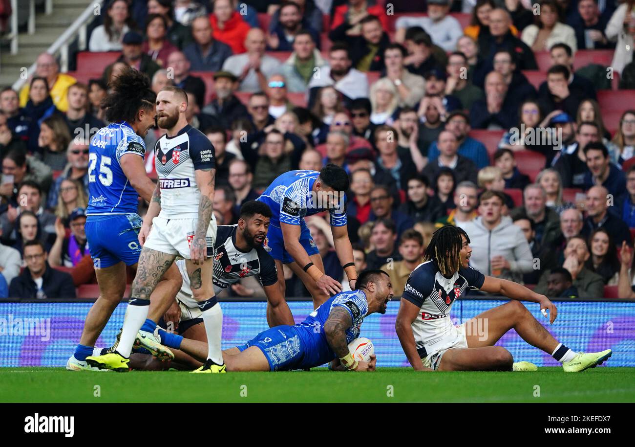 Samoa's Ligi Sao dives in to score his sides second try during the ...
