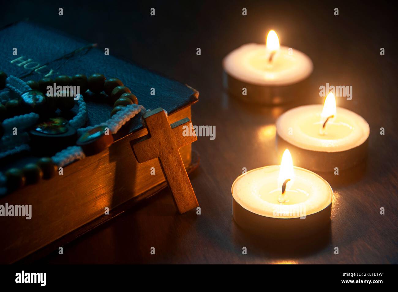 Holy Rosary, Bible and burning candles with customizable space for ...