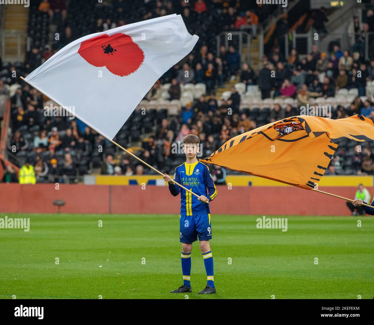 Today’s mascots flying Hull City flags and poppy flags for Remembrance ...